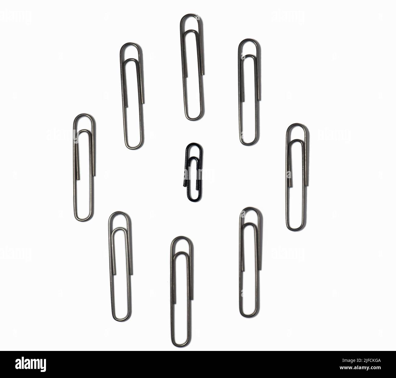 Large paper clips on a white background. Office supplies isolate. Paper ...