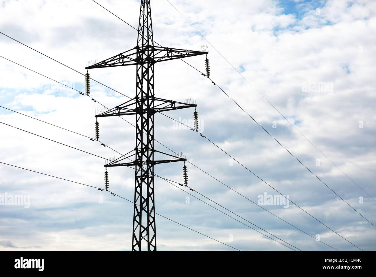 high-voltage power lines on blue sky background. electricity ...