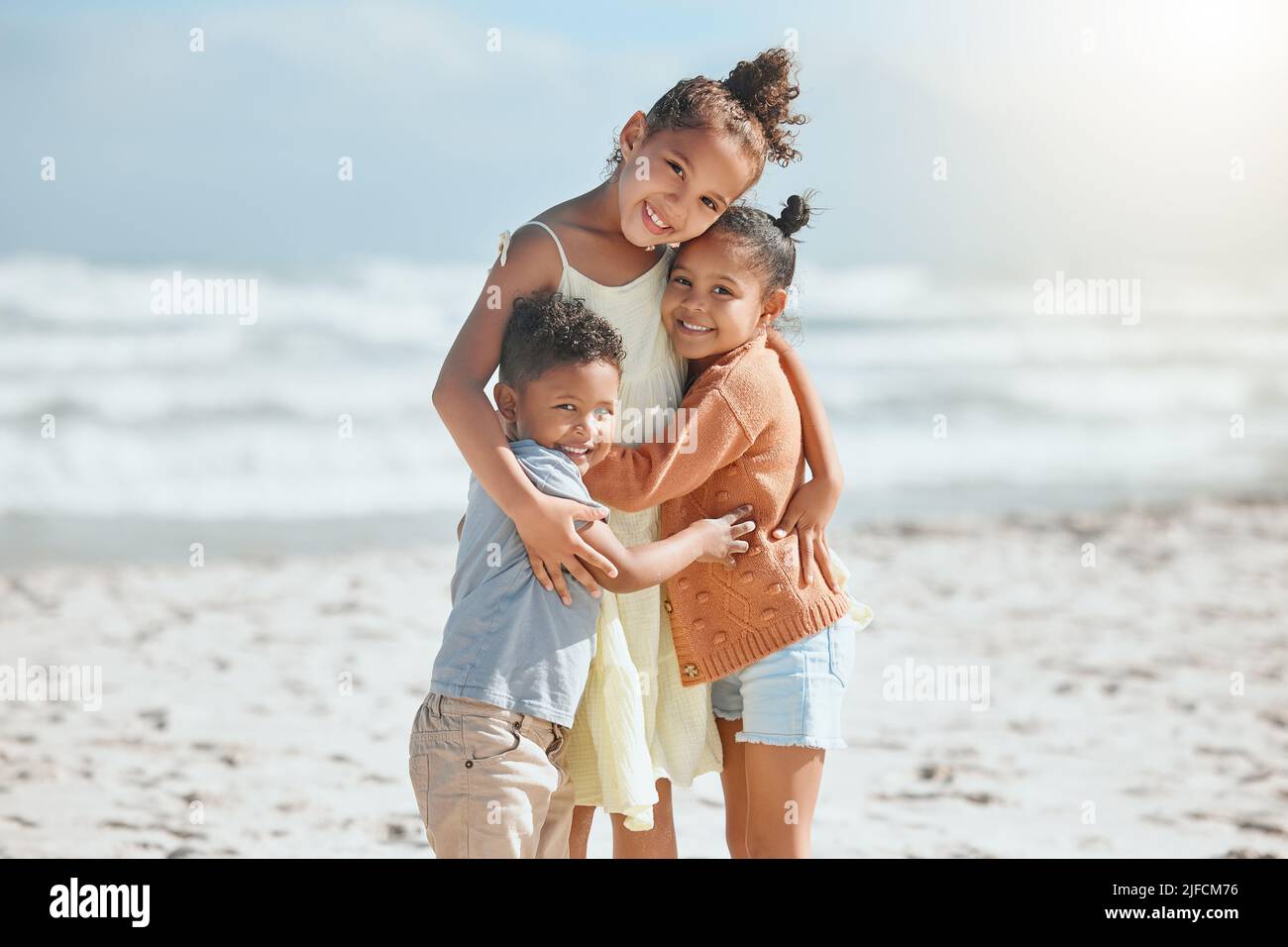 Happy little sister hugging her brother hi-res stock photography and ...