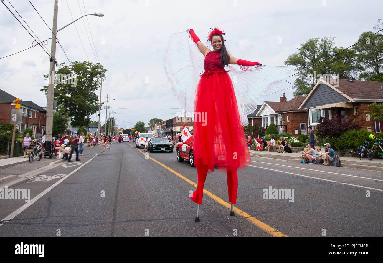 Toronto, Canada. 1st July, 2022. A dressed-up stilt walker performs ...