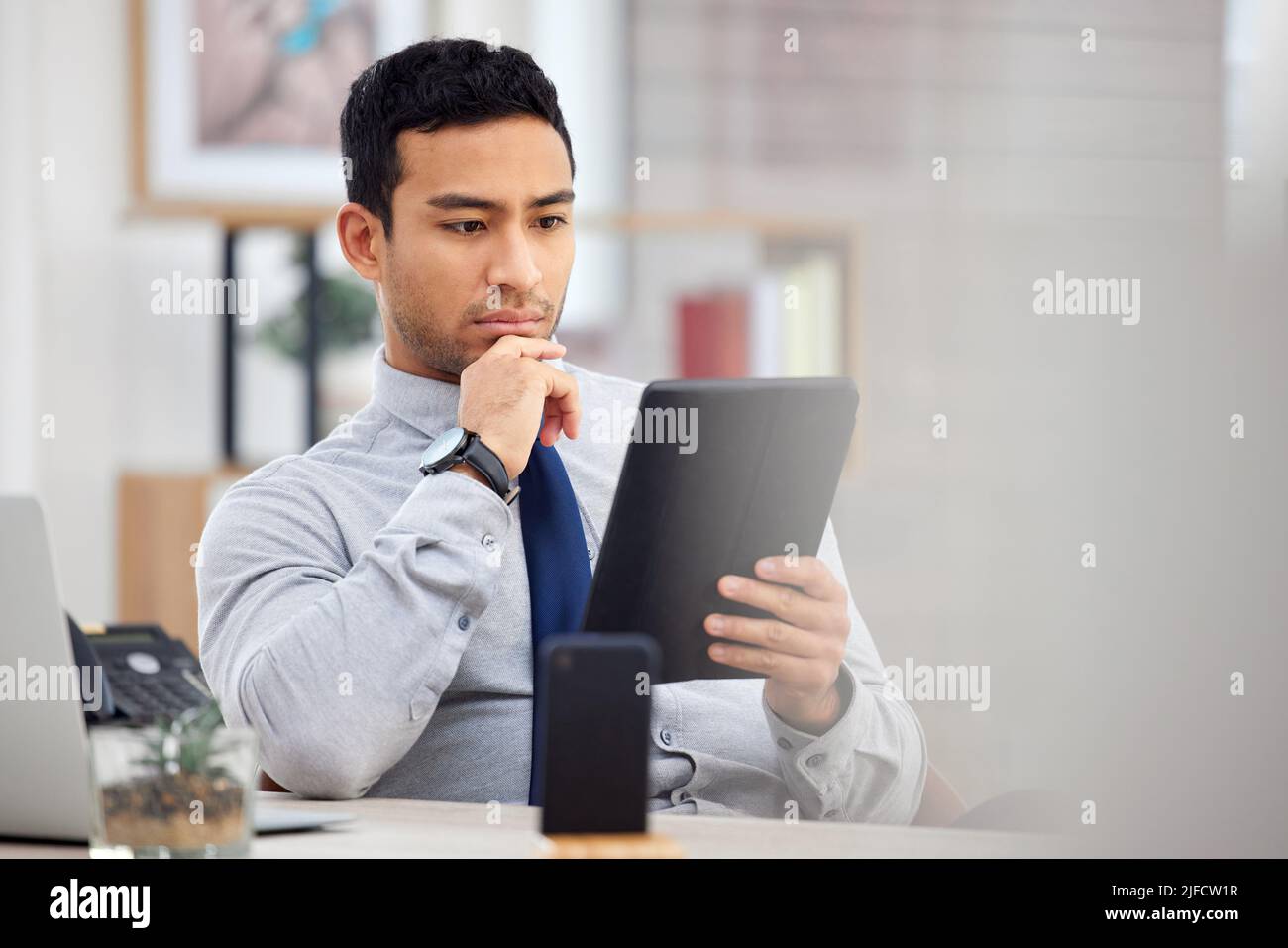 Focused businessman sitting table hi-res stock photography and images ...