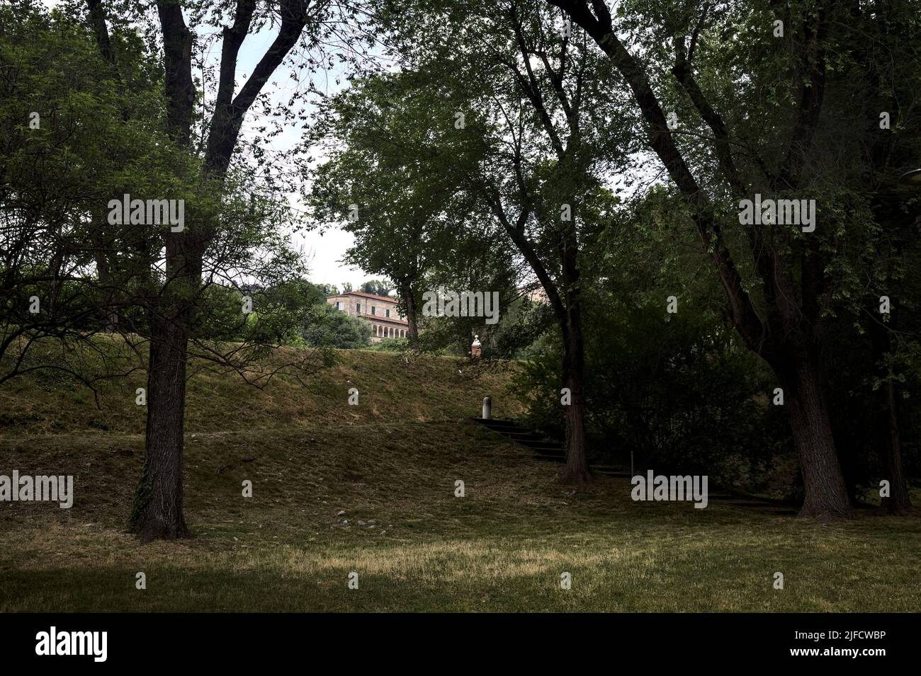 Embankments in a park with a stone staircase at their bottom Stock ...