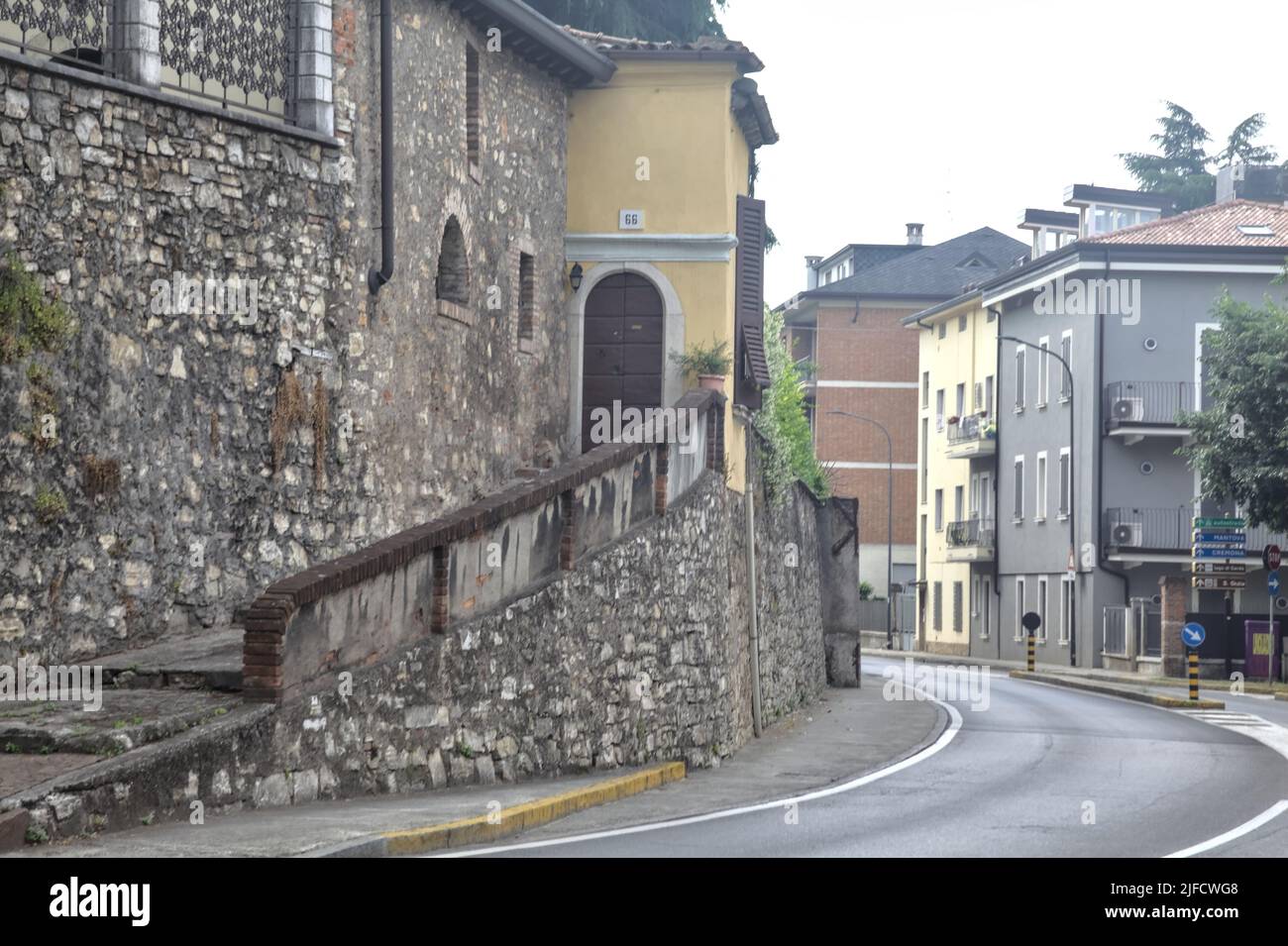 Stone fortification and a staircase that leads to a house by the edge ...