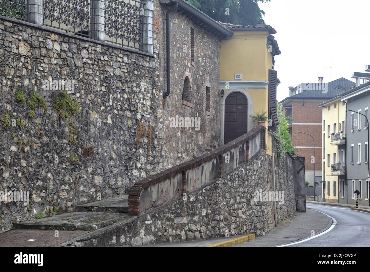 Stone fortification and a staircase that leads to a house by the edge ...