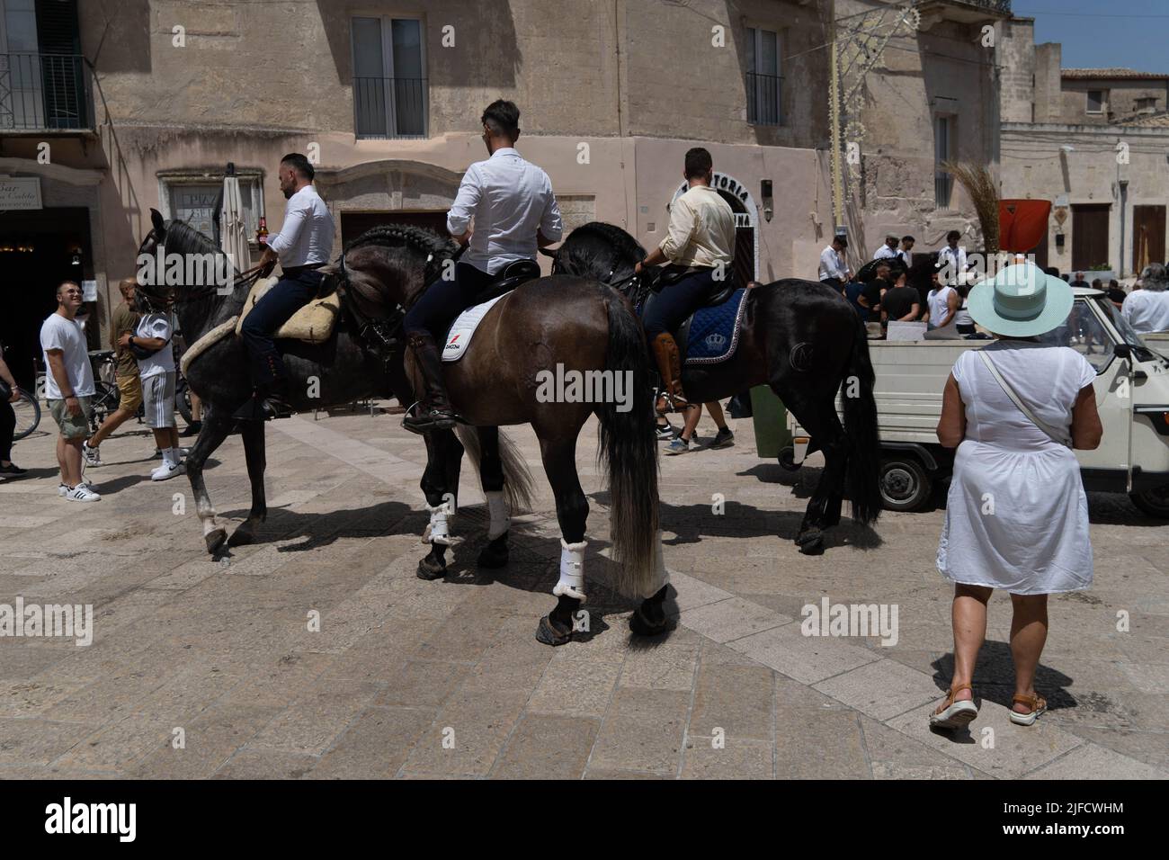 Matera, Matera, Italy. 1st July, 2022. Pilgrims ride their horses in ...
