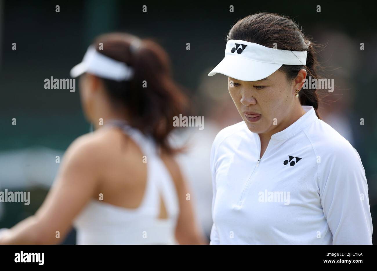 London, UK. 1st July, 2022. Han Xinyun/Zhu Lin (R) of China react ...