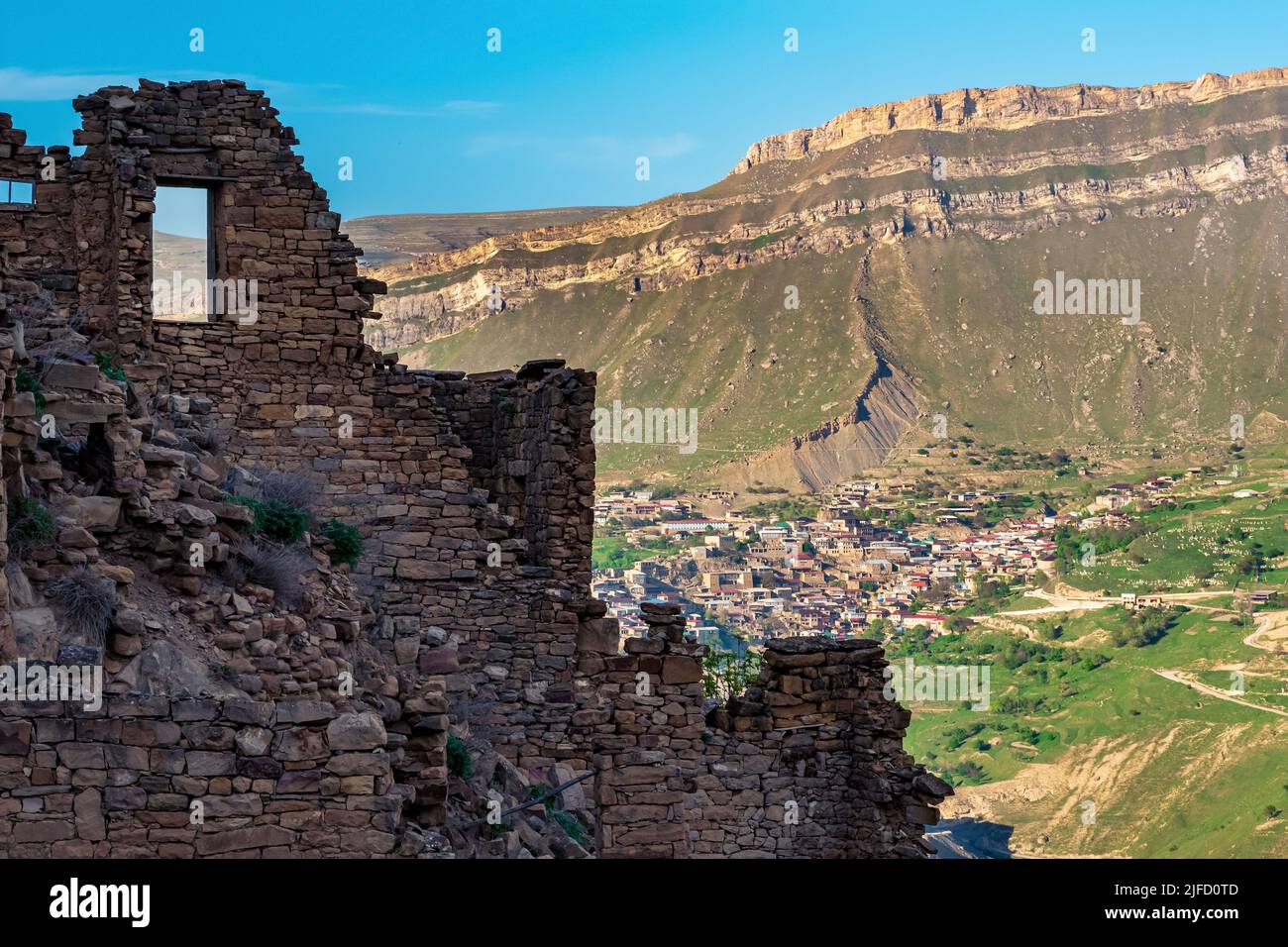walls of abandoned houses on a mountain cliff in the ghost village of ...