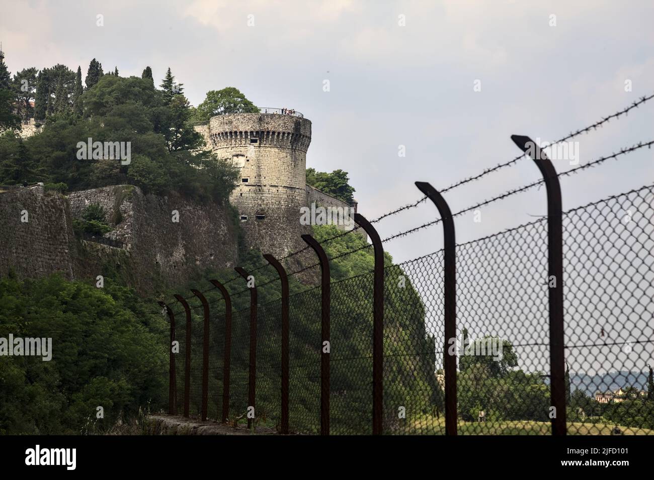 Water tower behind fence hi-res stock photography and images - Alamy