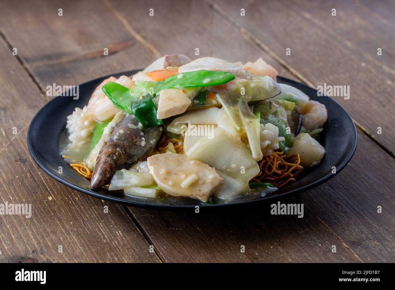 A serving of fresh salad Harbin with seafood Stock Photo - Alamy