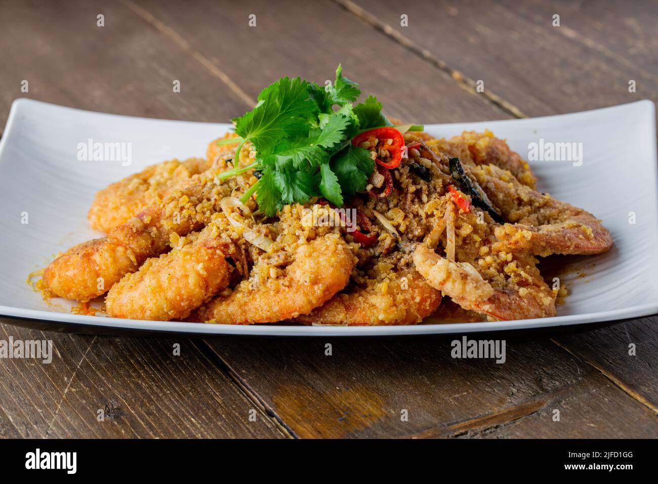 A serving of fresh crusty prawns Stock Photo - Alamy