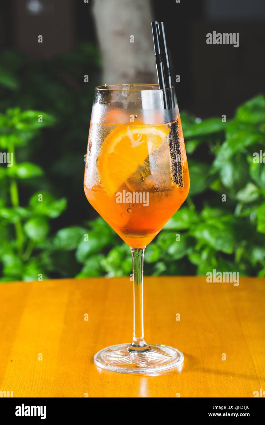Fresh aperol with plastic straws Stock Photo - Alamy