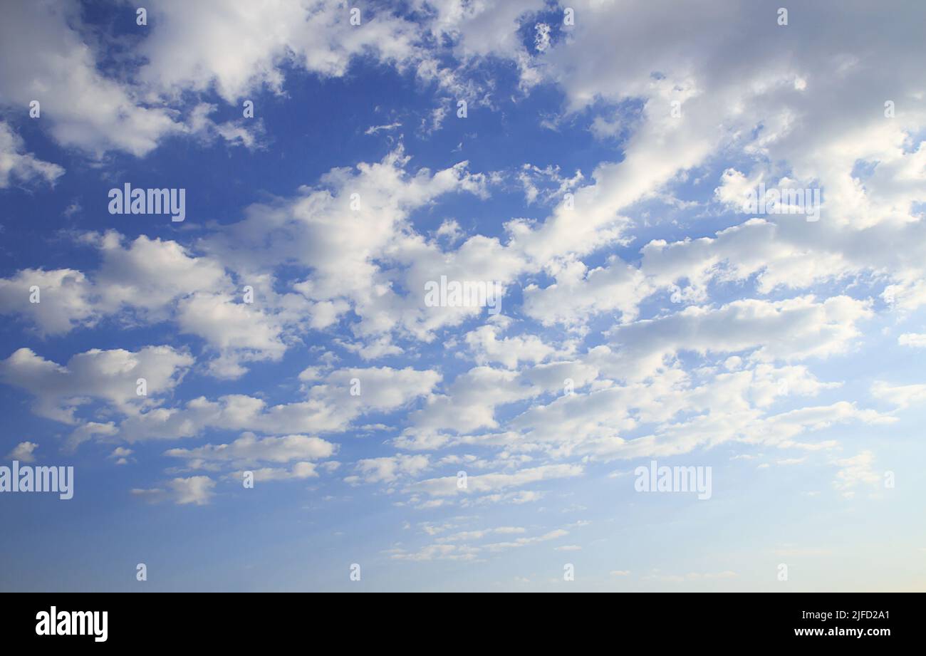 Blue sky and white cloud background for any design Stock Photo - Alamy