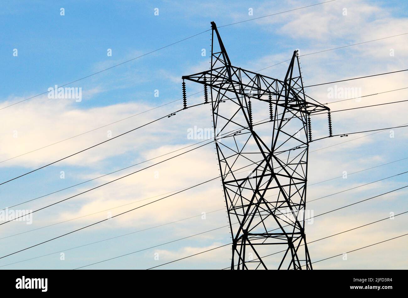 Electric lines and support tower Stock Photo - Alamy