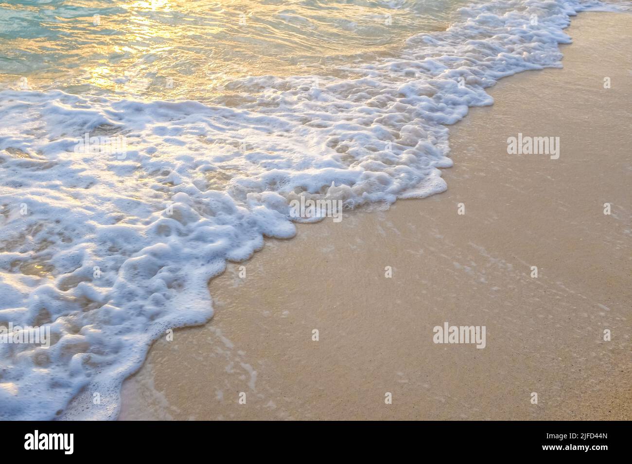 Sea wave on white sand beach summer vacation background Stock Photo - Alamy