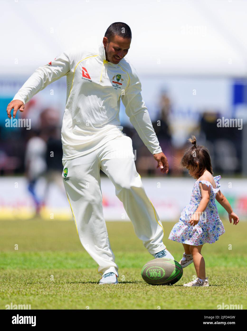 Australia's Usman Khawaja plays with his daughter after winning the 1st ...