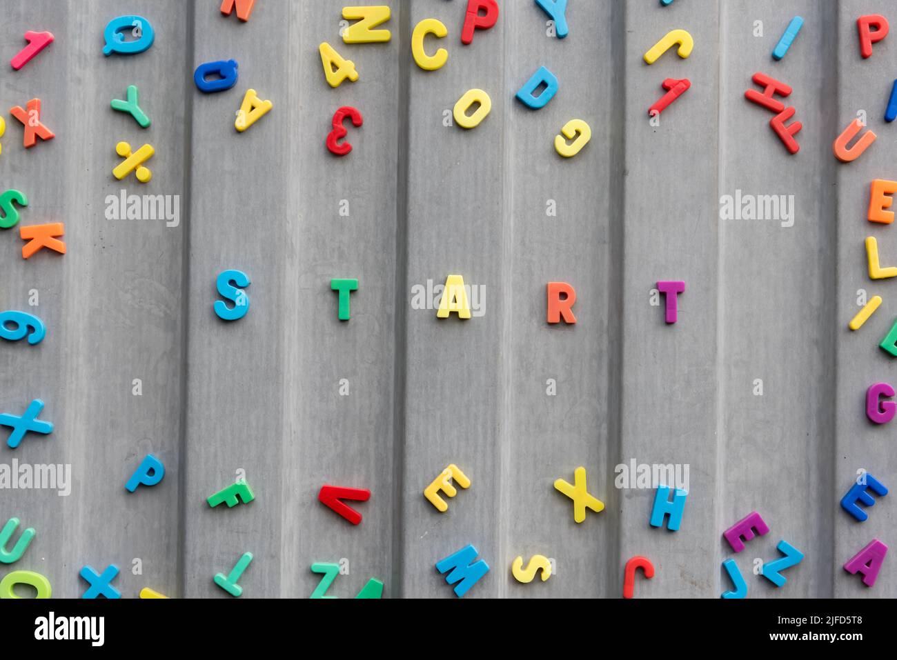 The word start laid out in magnetic letters Stock Photo - Alamy