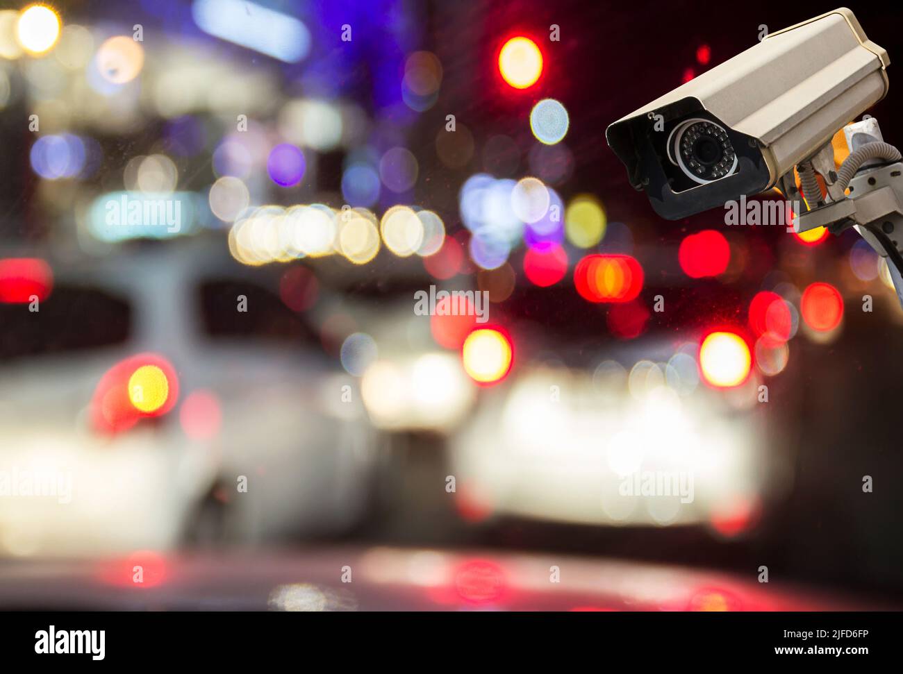 Image Of Cctv Security Camera On Blurred Night Street Background