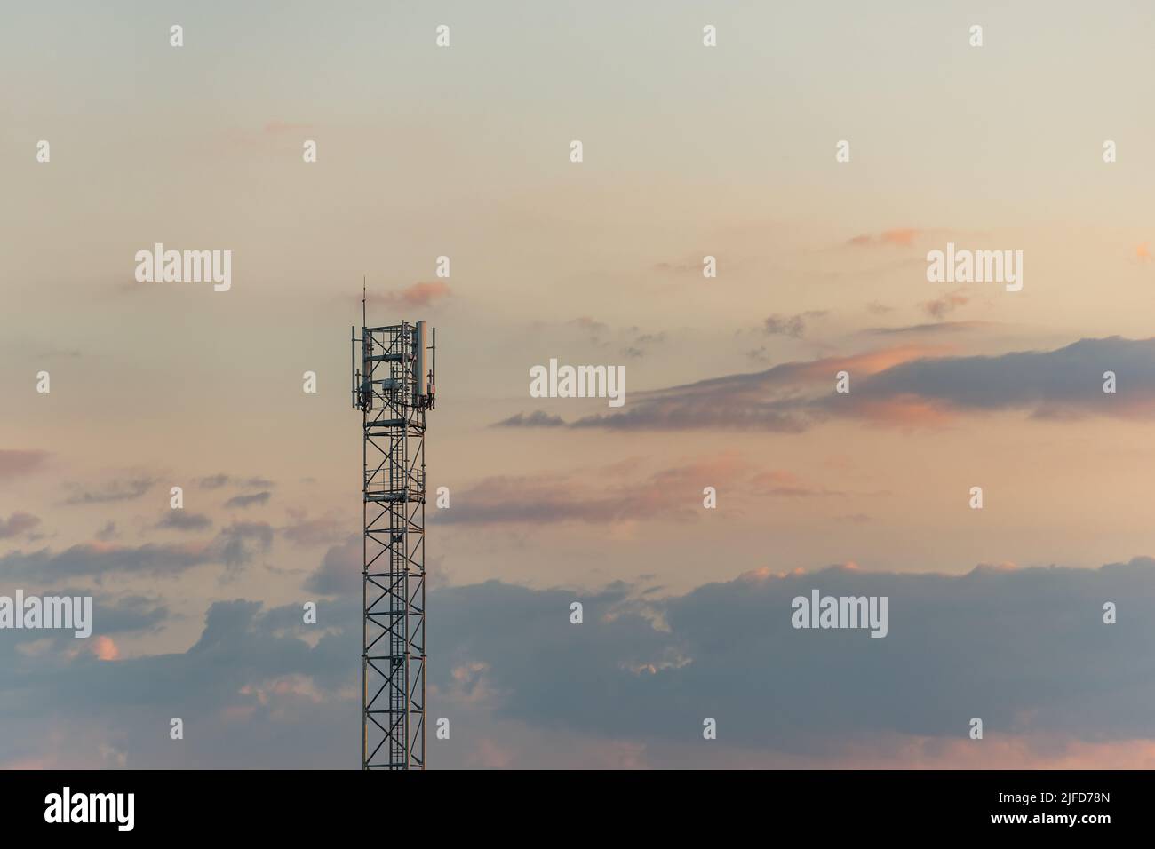 Telecom antenna in countryside in summer at sunset. Alsace, France ...