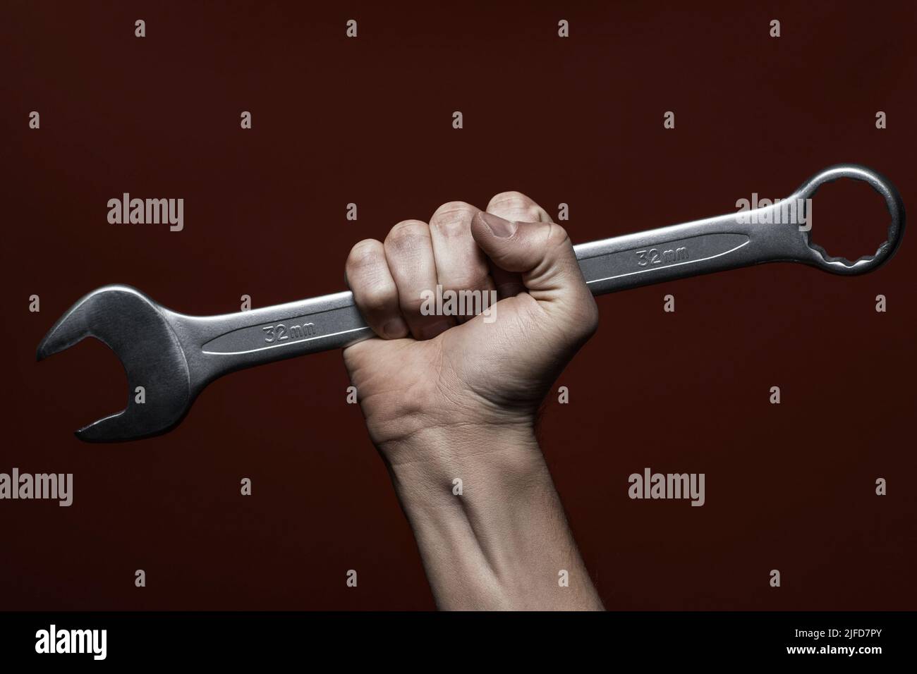 Hand mechanic holding wrench hi-res stock photography and images - Alamy