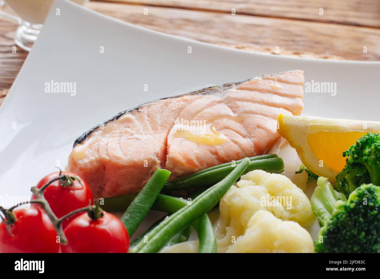Seafood in lent. Salmon steak and vegetables Stock Photo - Alamy