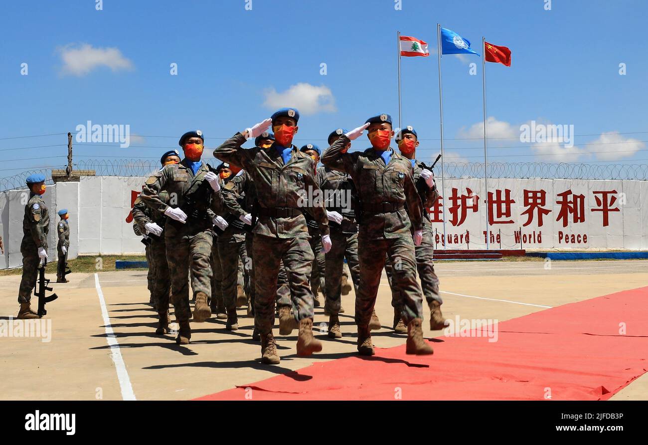 Beirut, Lebanon. 1st July, 2022. Chinese peacekeepers march at a medal parade ceremony in ...
