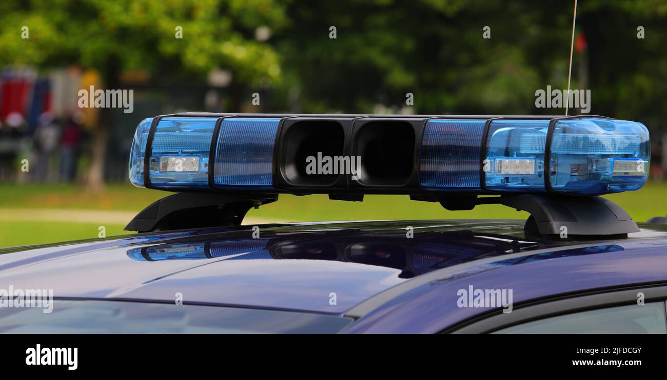 sirens of a police car during a patrol in the park known to the drug ...