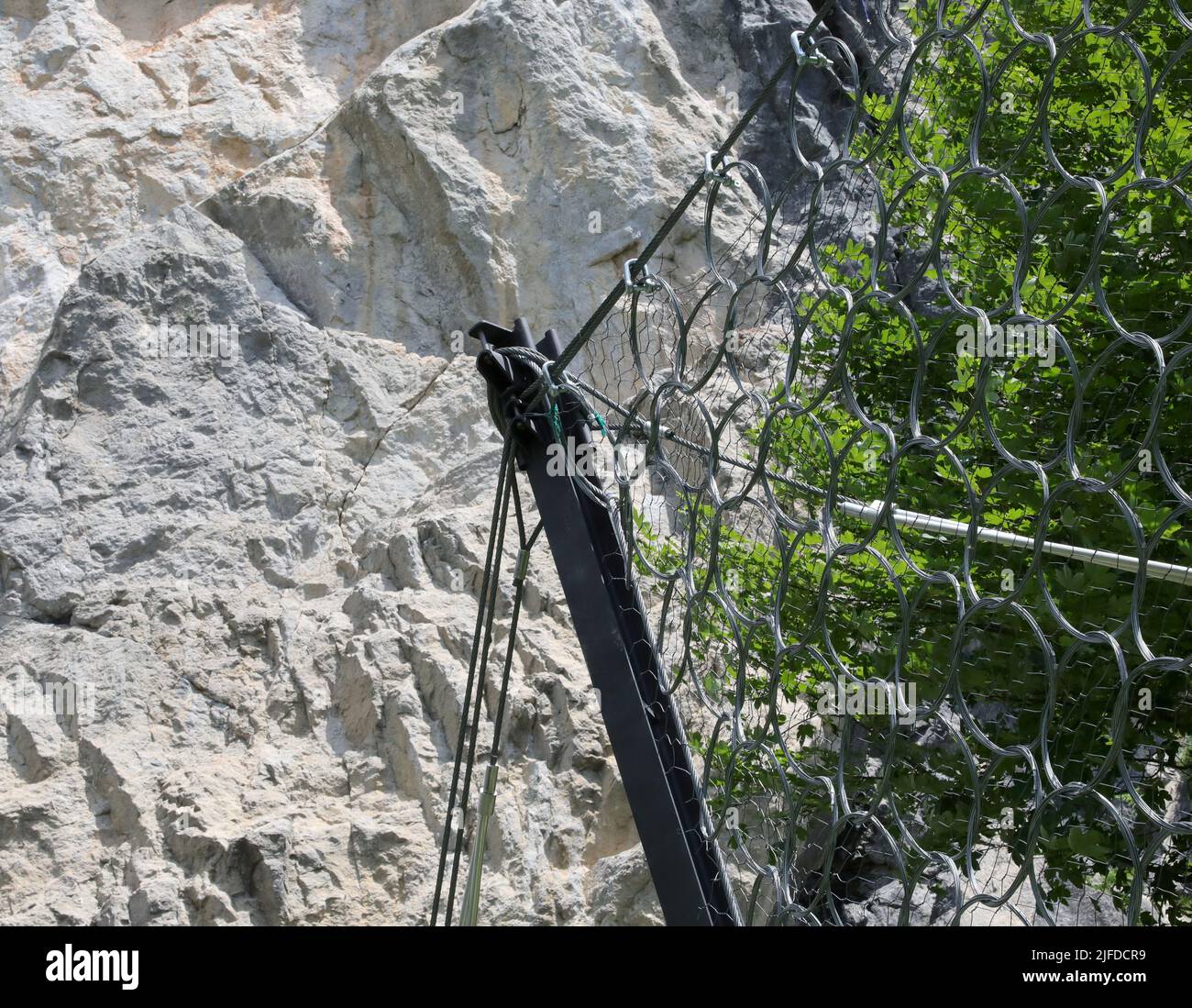 detail of sturdy metal mesh for protection against falling rocks and ...