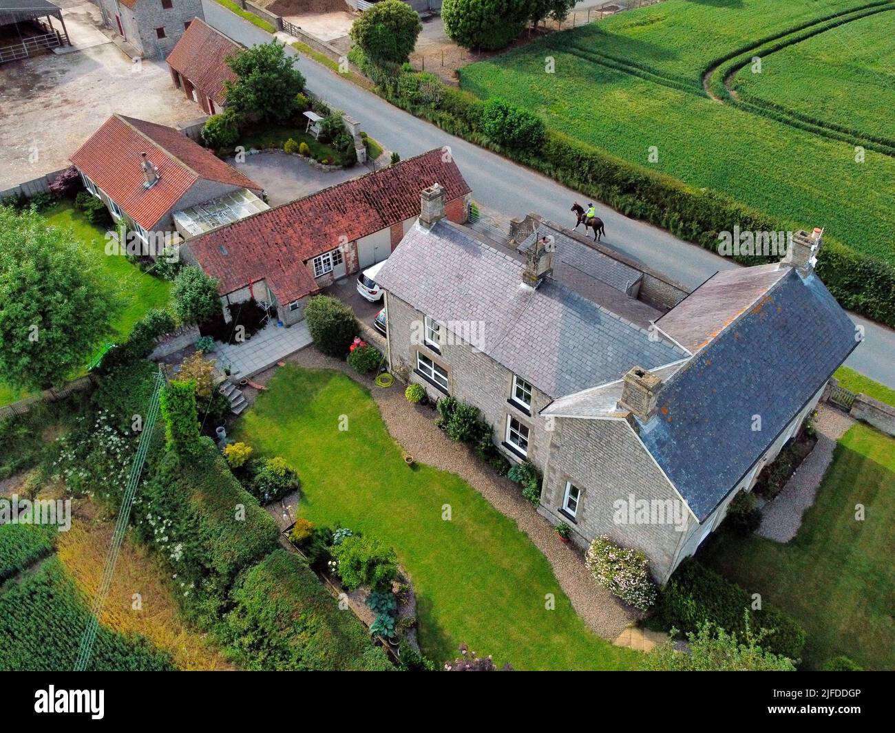 Aerial view of a farm in the countryside of North Yorkshire in the ...