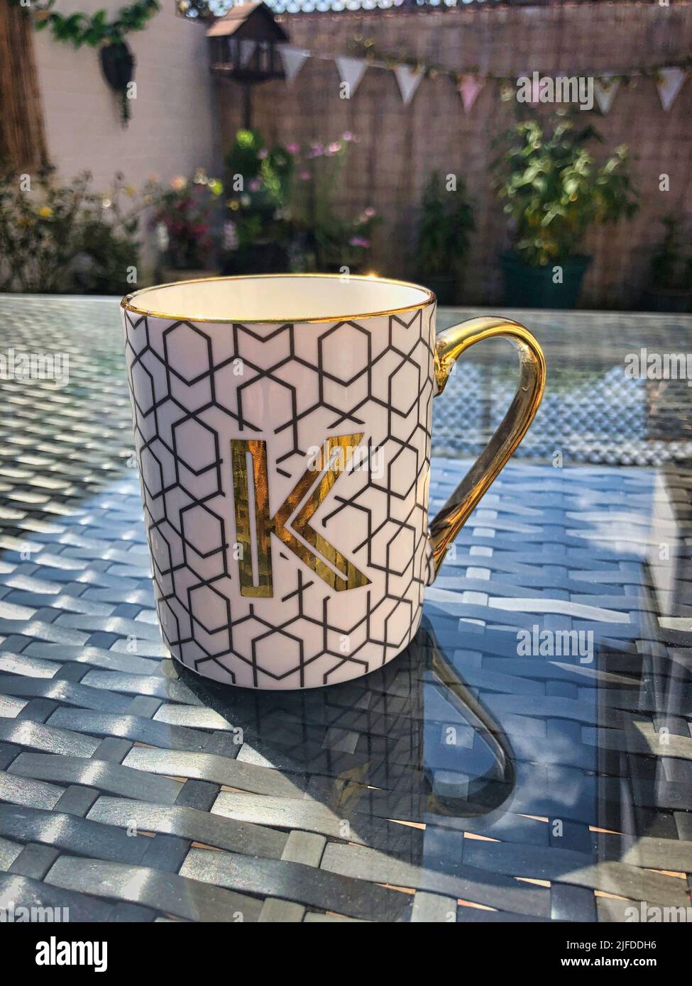 Mug with letter K on Stock Photo - Alamy
