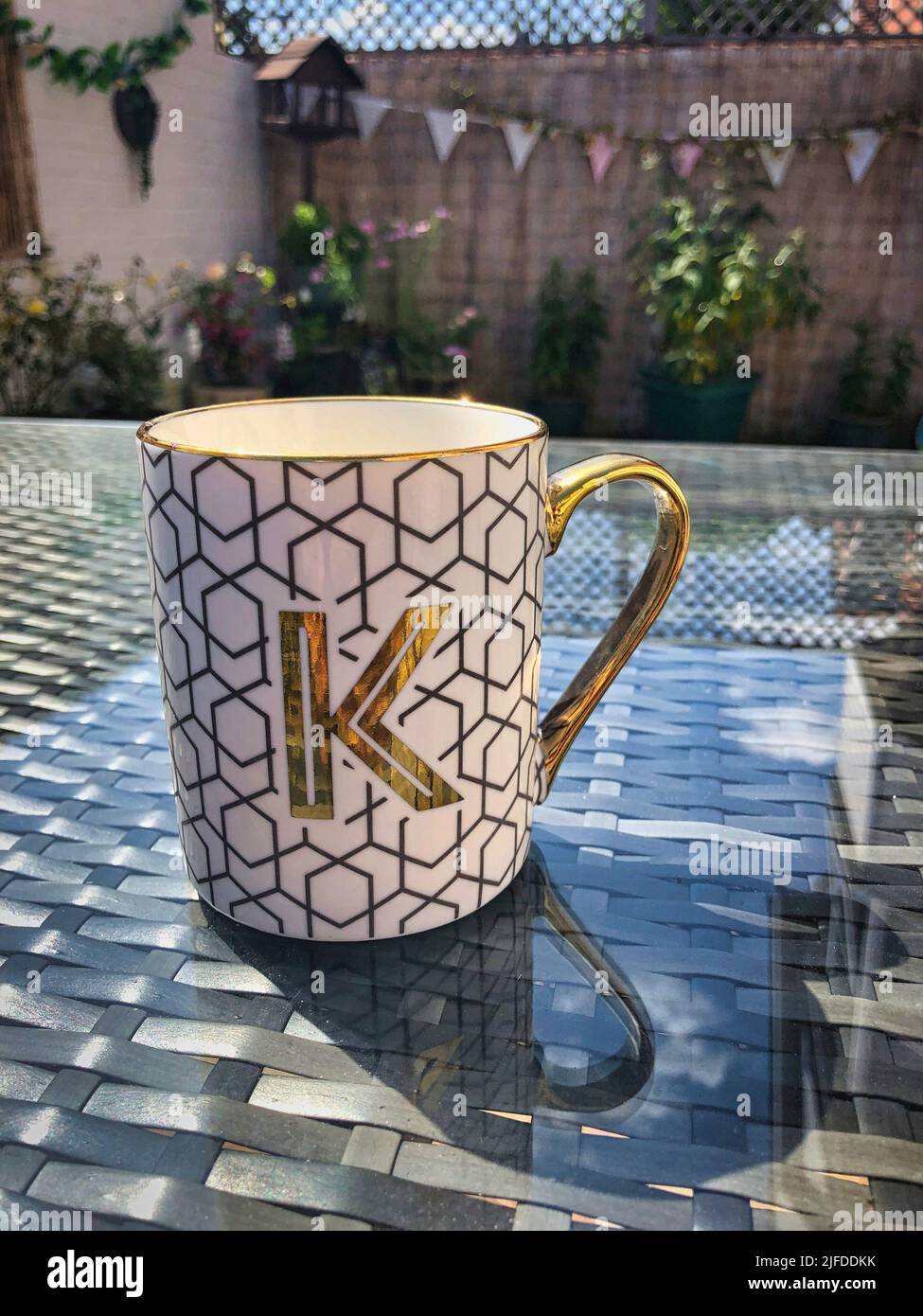 Mug with letter K on Stock Photo - Alamy