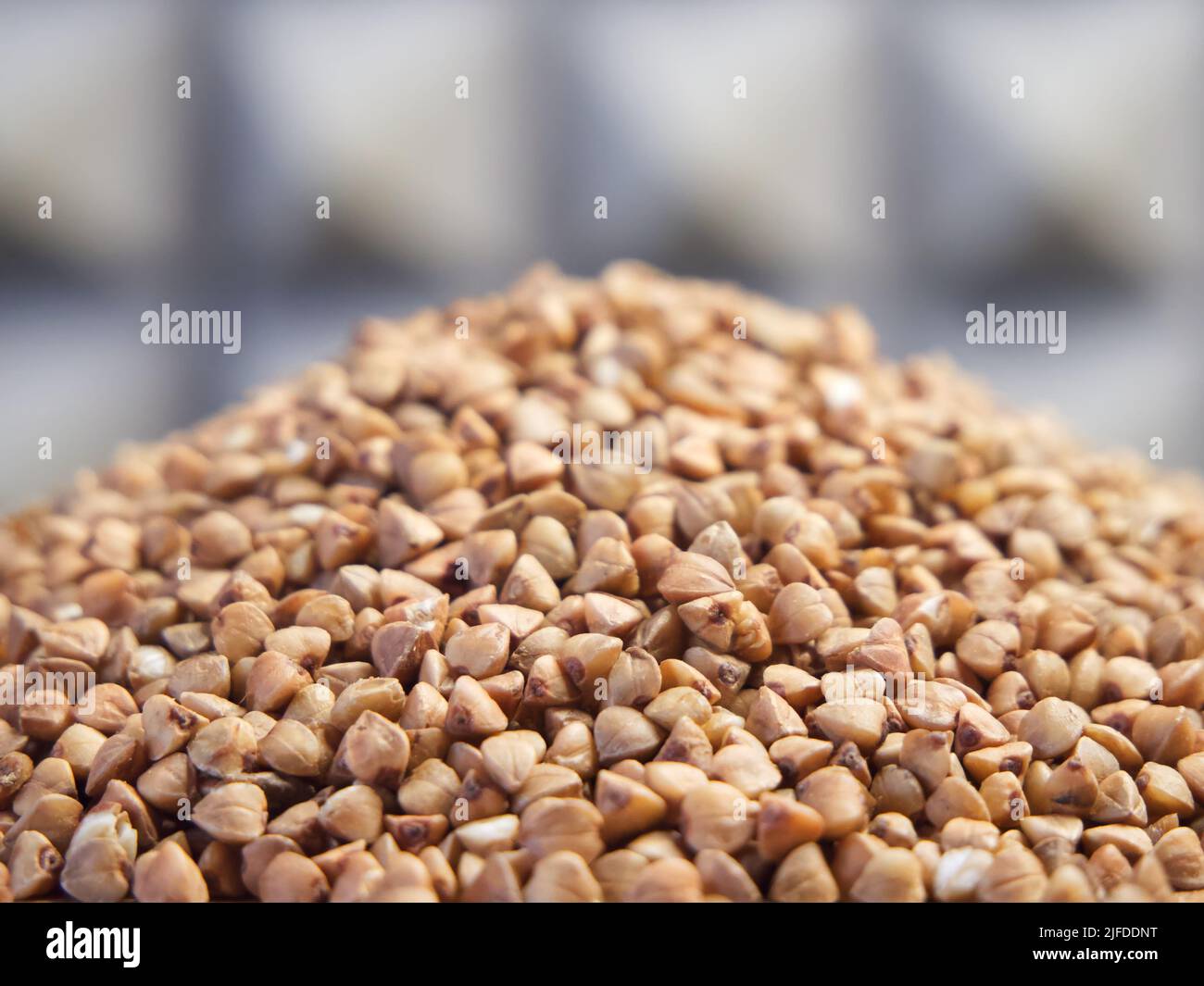 Pile of buckwheat, side view, close-up. Dark raw Buckwheat high-quality ...