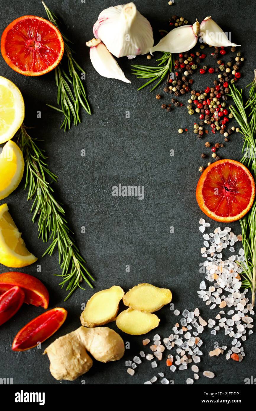 . Set spice on a black stone board. Peppers mix, Himalayan salt ...