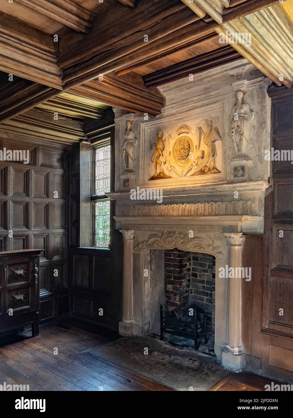 Fireplace and coat of arms in Little Moreton Hall, a 16th-century half ...