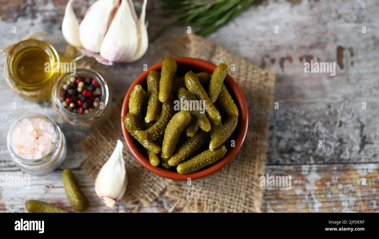 Gherkins. Mini gherkins in a bowl. Pickles. Condiments and spices Stock ...