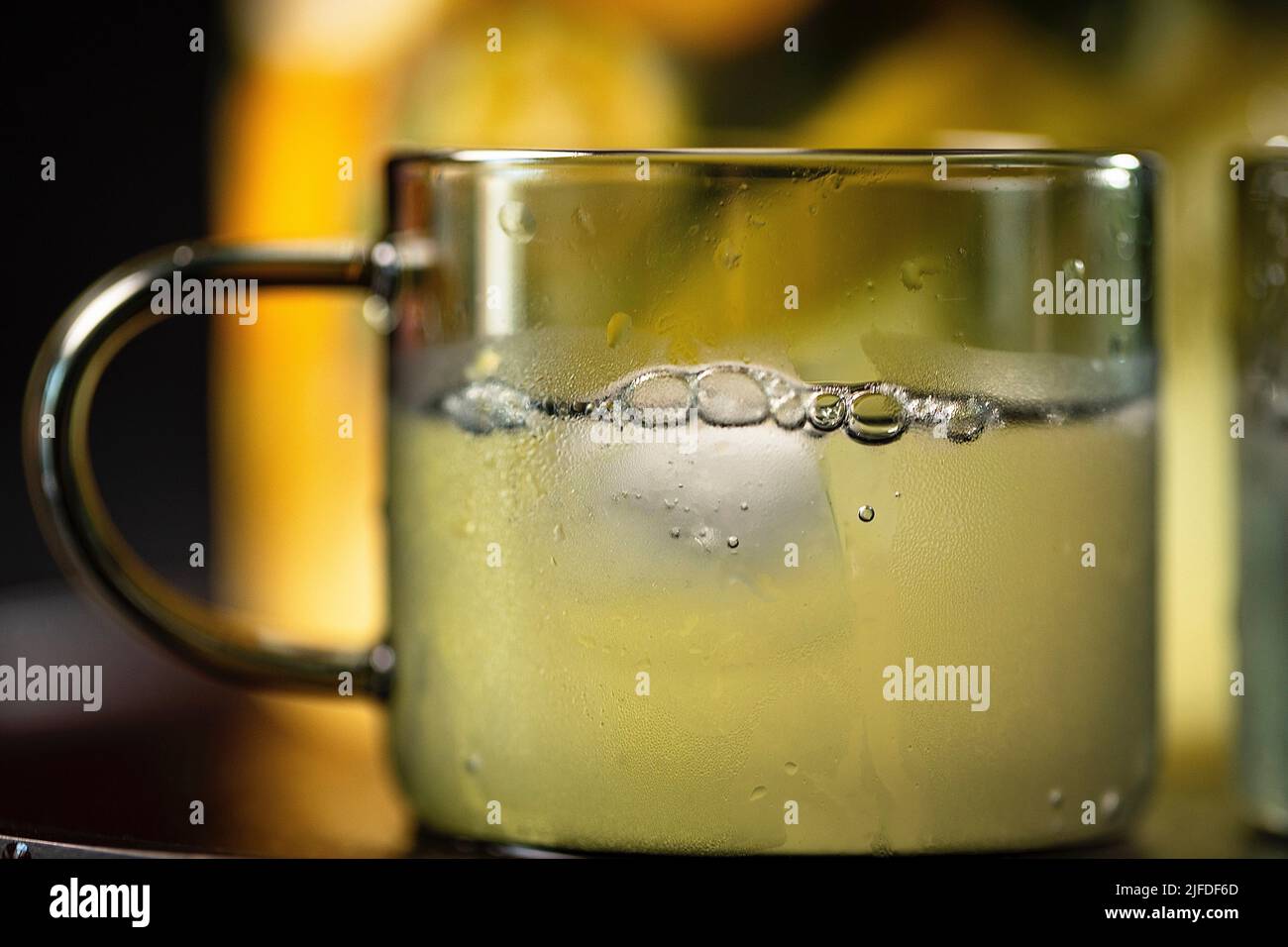 Chilled citrus fruit mix, cool and fruity cold drink making process ...