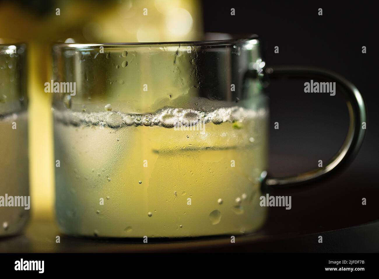 Chilled citrus fruit mix, cool and fruity cold drink making process ...