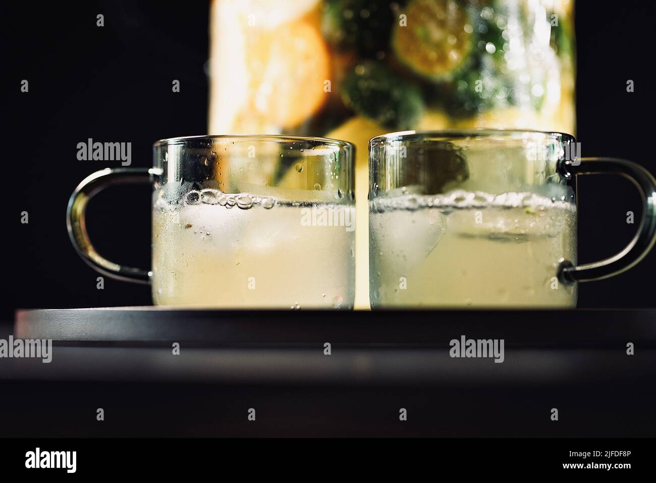 Chilled citrus fruit mix, cool and fruity cold drink making process ...