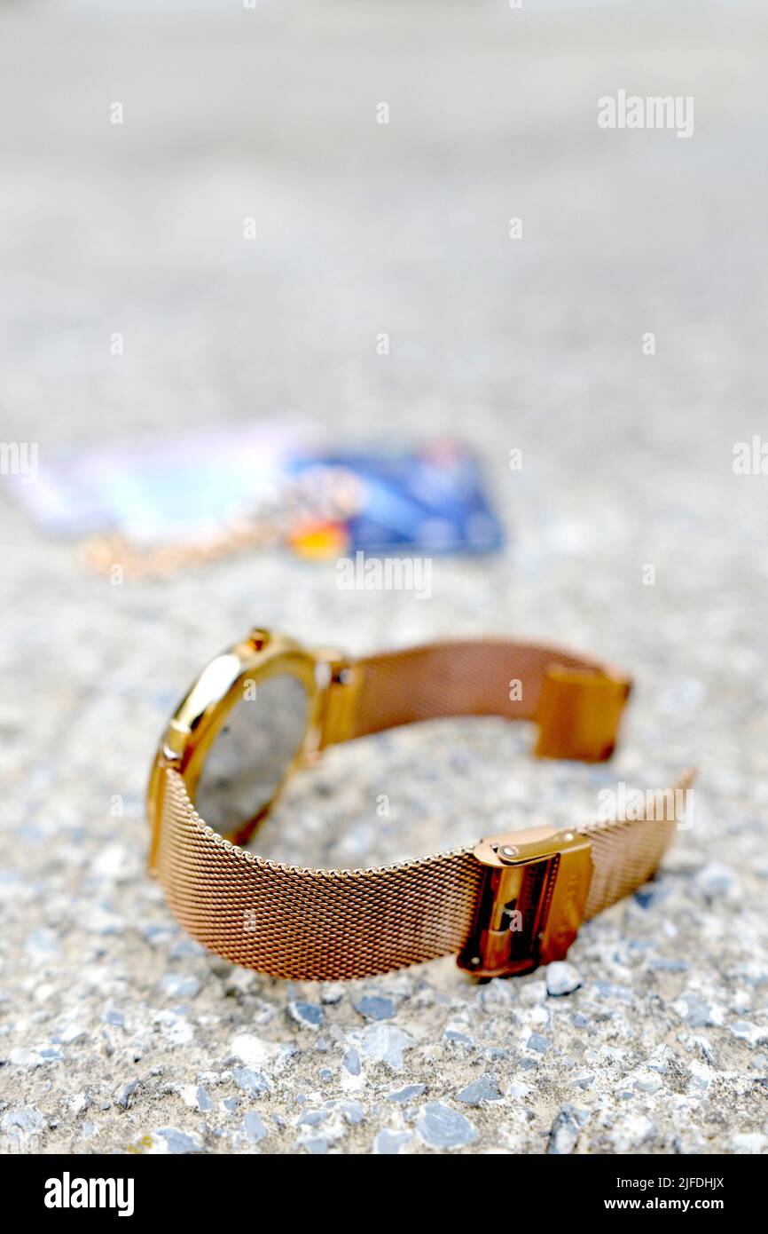 men's watch shot a on a concrete background Stock Photo - Alamy