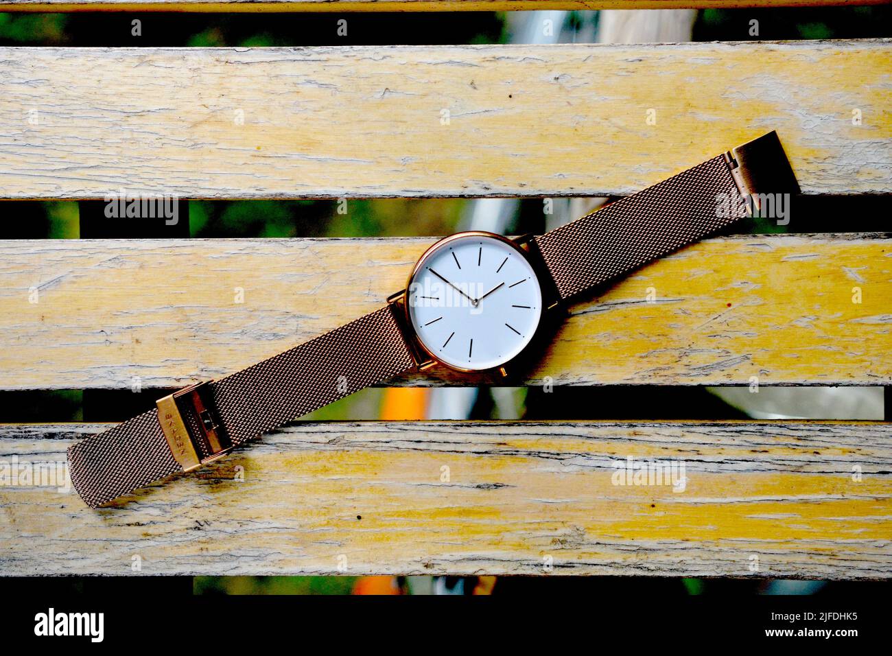 men's watch shot a on a wood background Stock Photo - Alamy