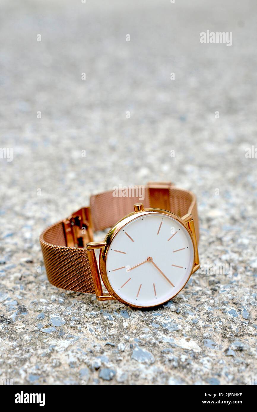 men's watch shot a on a concrete background Stock Photo - Alamy