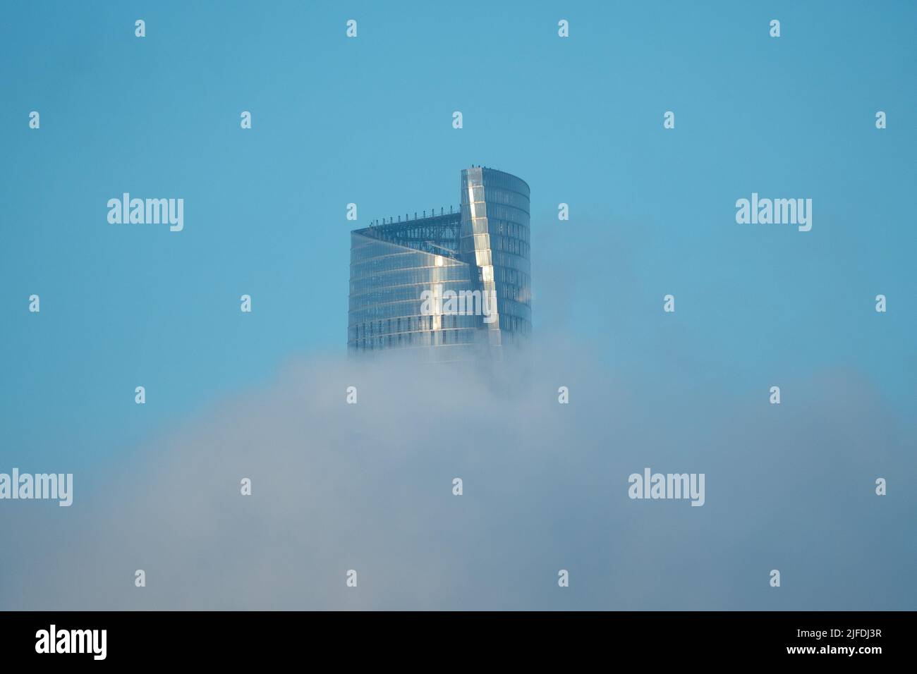 SHANGHAI, CHINA - JULY 2, 2022 - The spire of the Shanghai Tower is ...