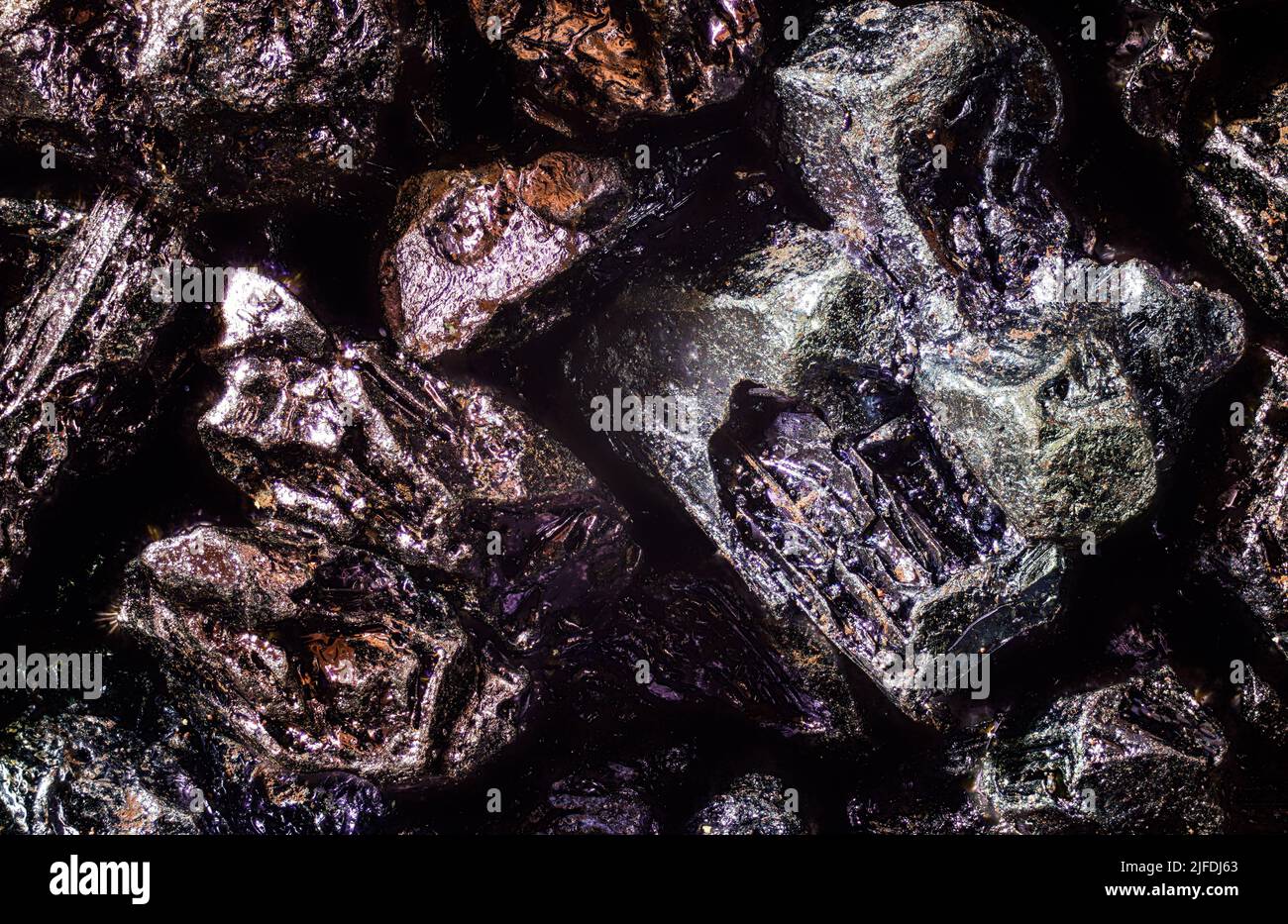 Potassium permanganate crystals under 4x magnification microscope ...