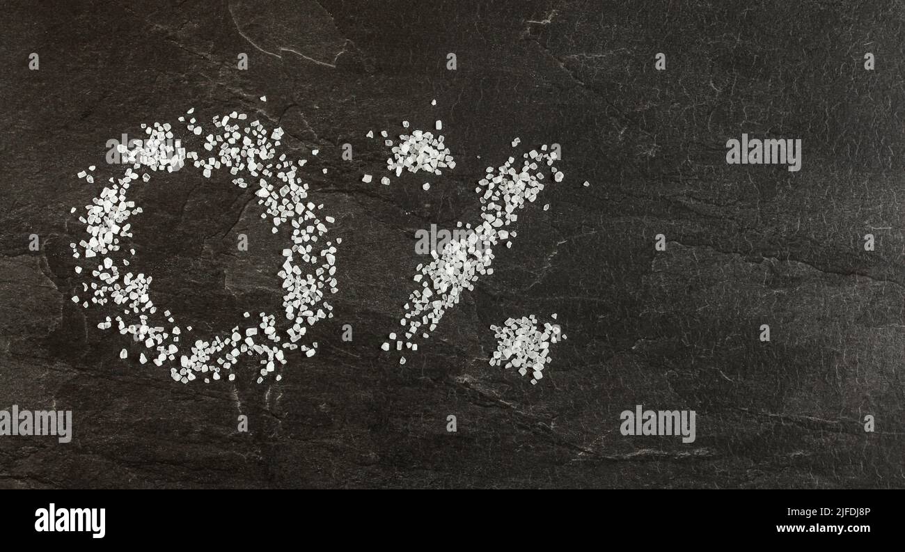 Zero percent sign made from salt crystals, photo from above - space for ...