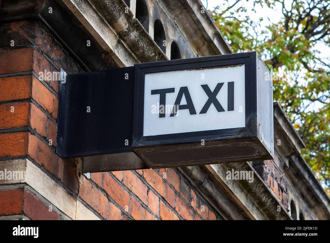 Close-up of a Taxi sign in London, UK Stock Photo - Alamy