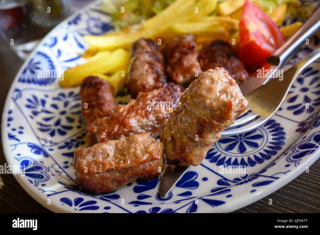 Cevapi also called Cevapсici - small sausages from chopped pork and ...