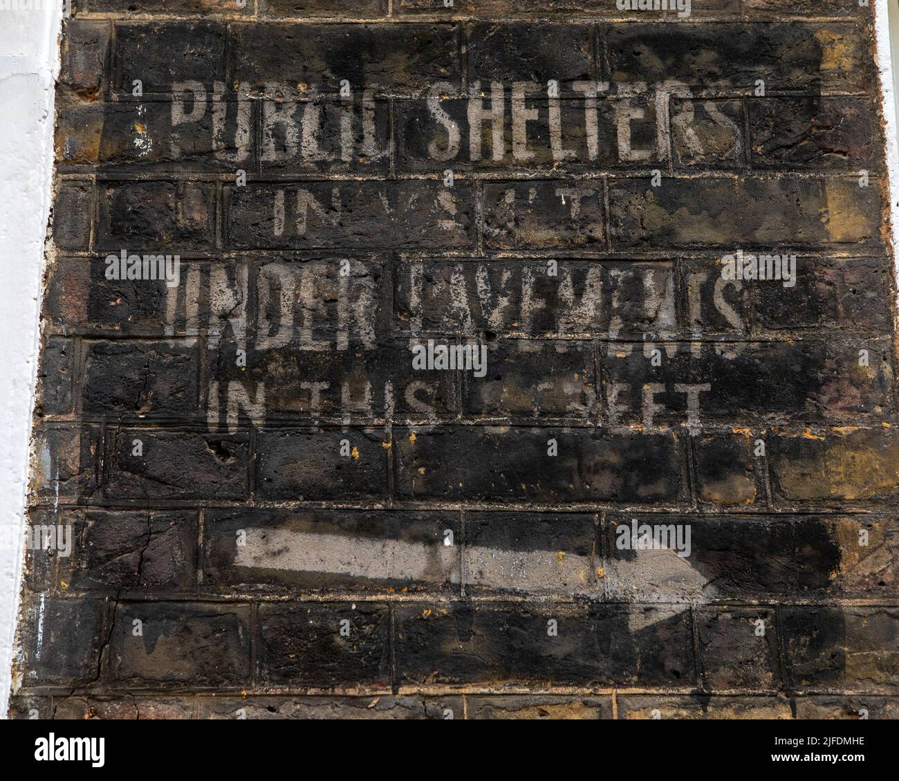 London, UK - April 20th 2022: Historic ghost signs on a street in ...