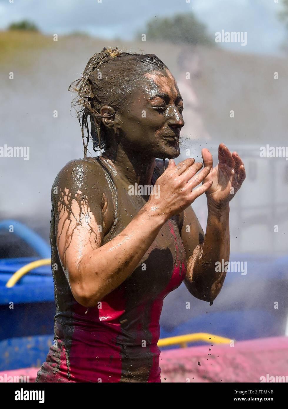 Women covered in mud hi-res stock photography and images - Alamy