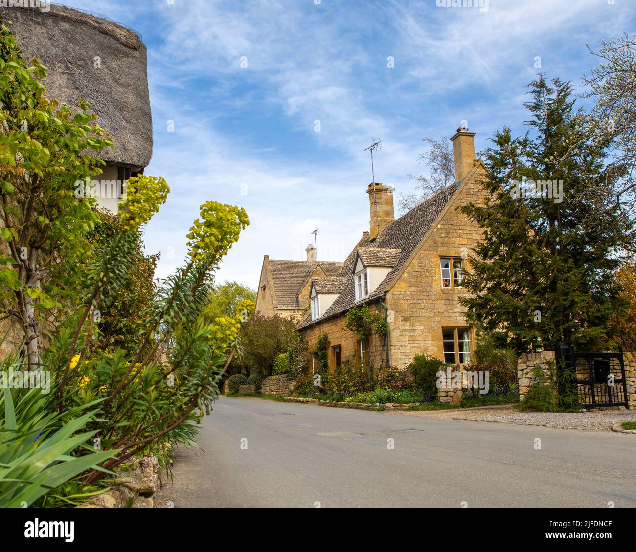 A scene in the pretty Cotswolds village of Stanton, in Gloucestershire ...