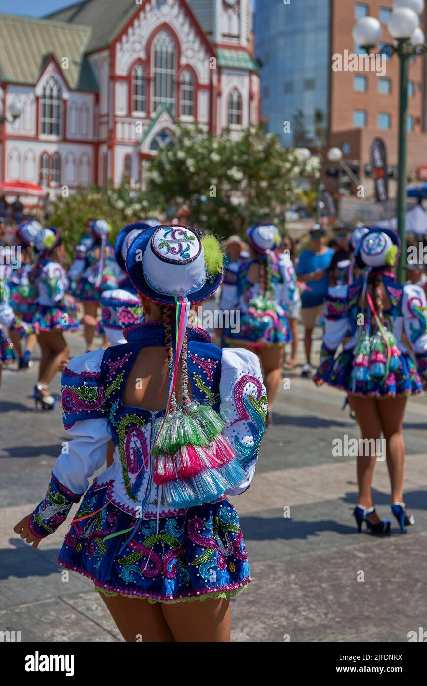 Caporales dancers in ornate costumes performing at the annual Carnaval ...