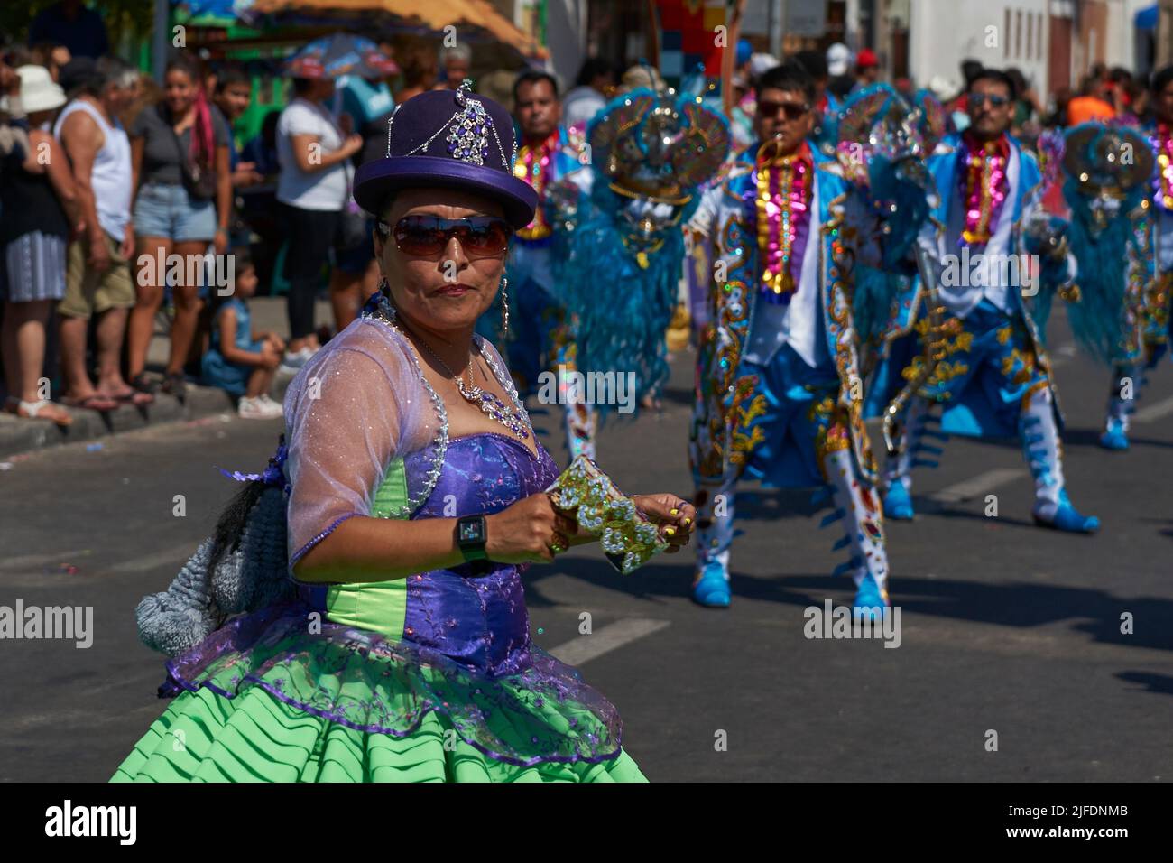 Morenada dancers performing during a street parade at the annual ...